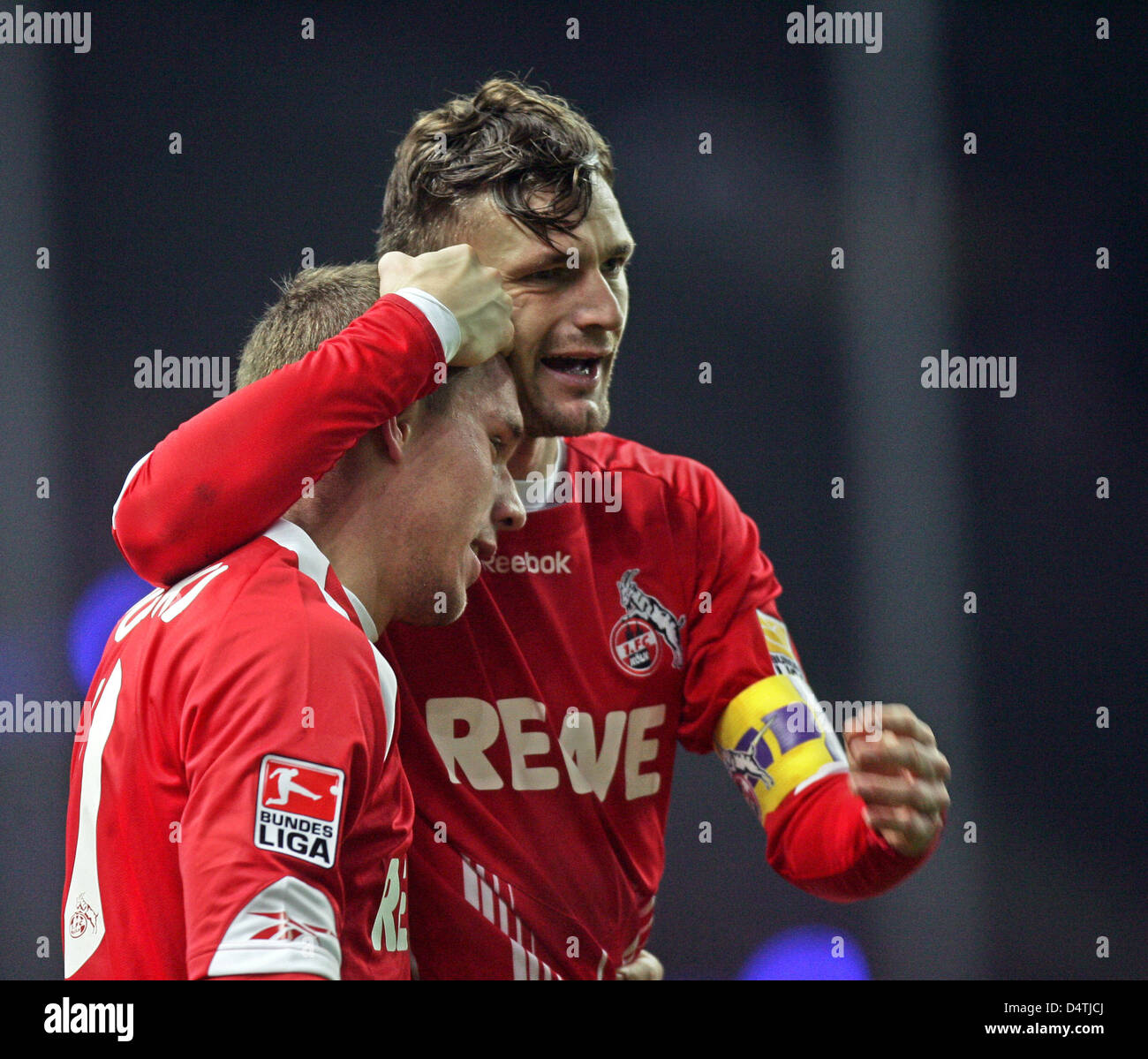 Cologne?s Milivoje Novakovic (R) cheers with his teammate Lukas ...