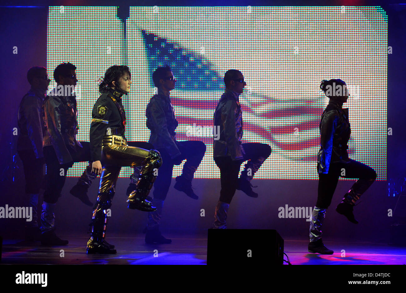 Michael Jackson double Andre Santisi (3-L) performs as Michael Jackson ...