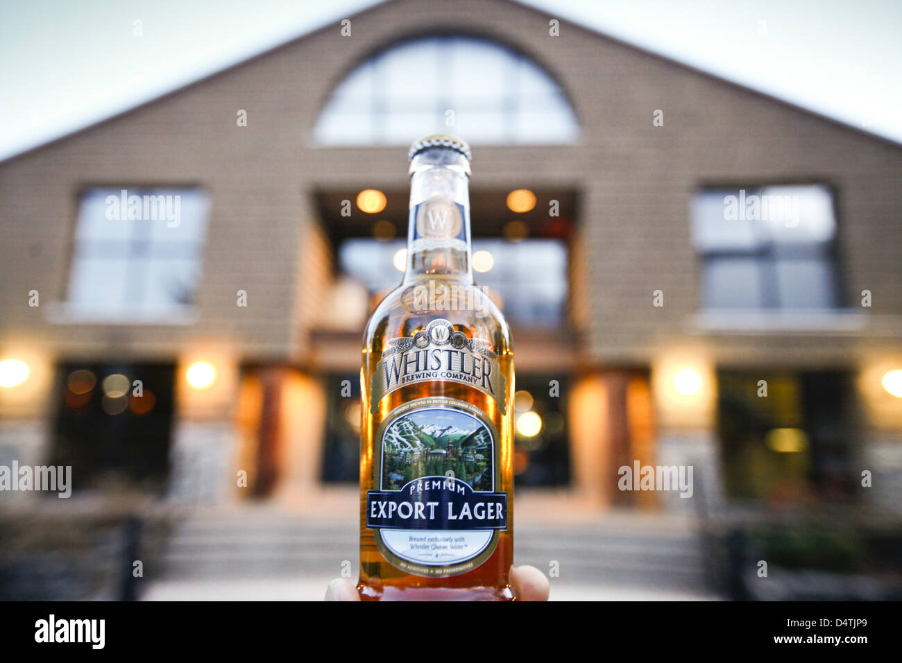 A bottle of lager pictured in front of the local brewery of the winter ...