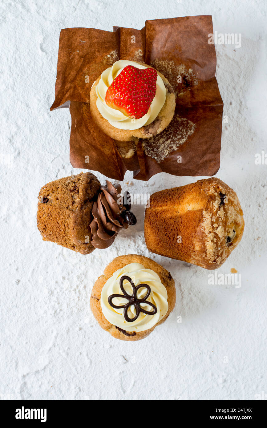 A colourful selection of muffins and cupcakes Stock Photo - Alamy