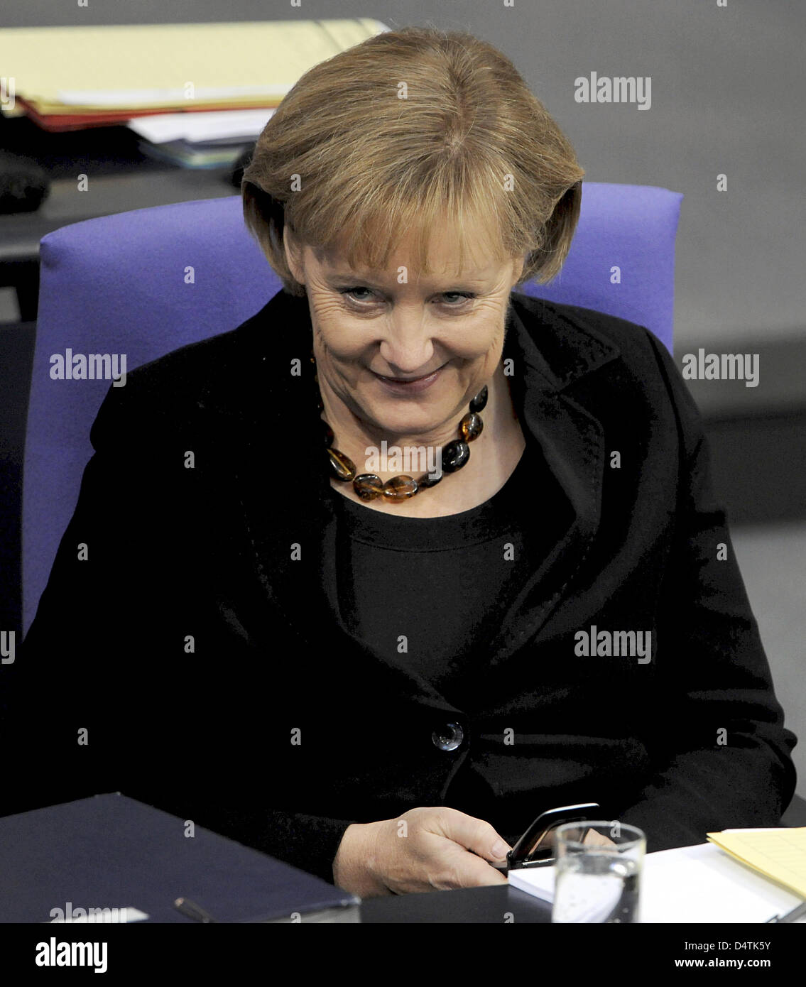 German Chancellor Angela Merkel smiles ahead of the first government ...