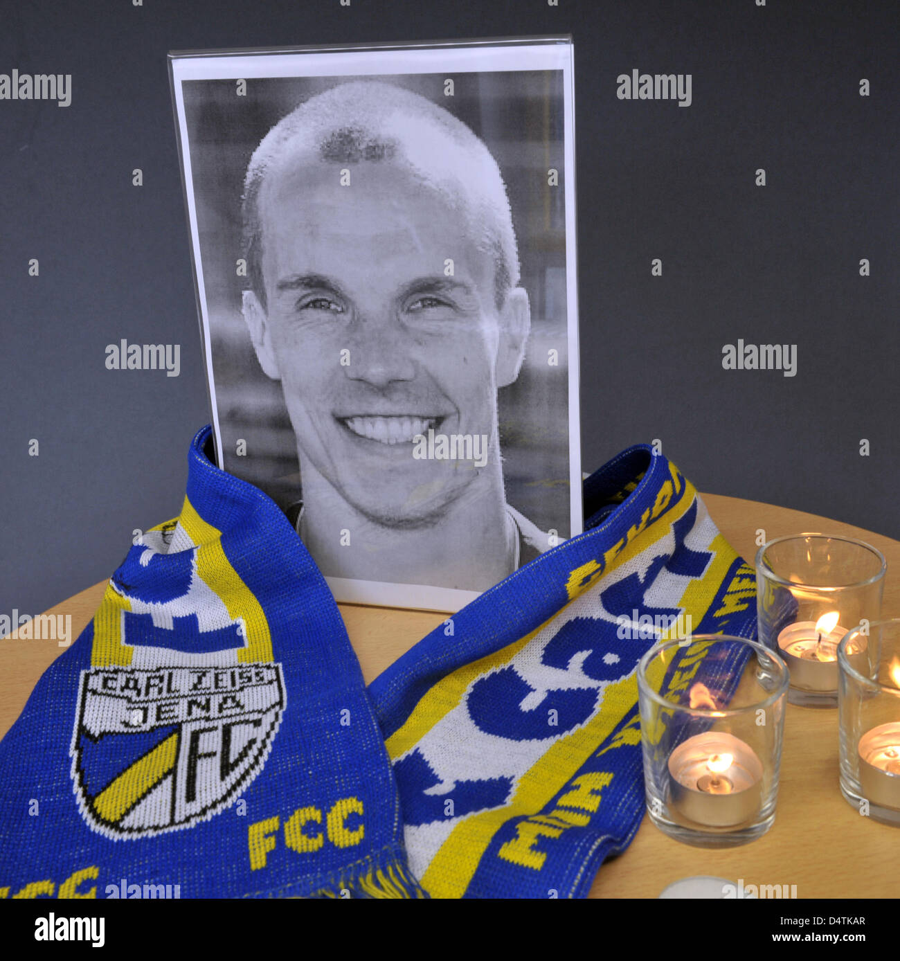 A photography, a fan scarf and candles commemorate Germany goalkeeper ...