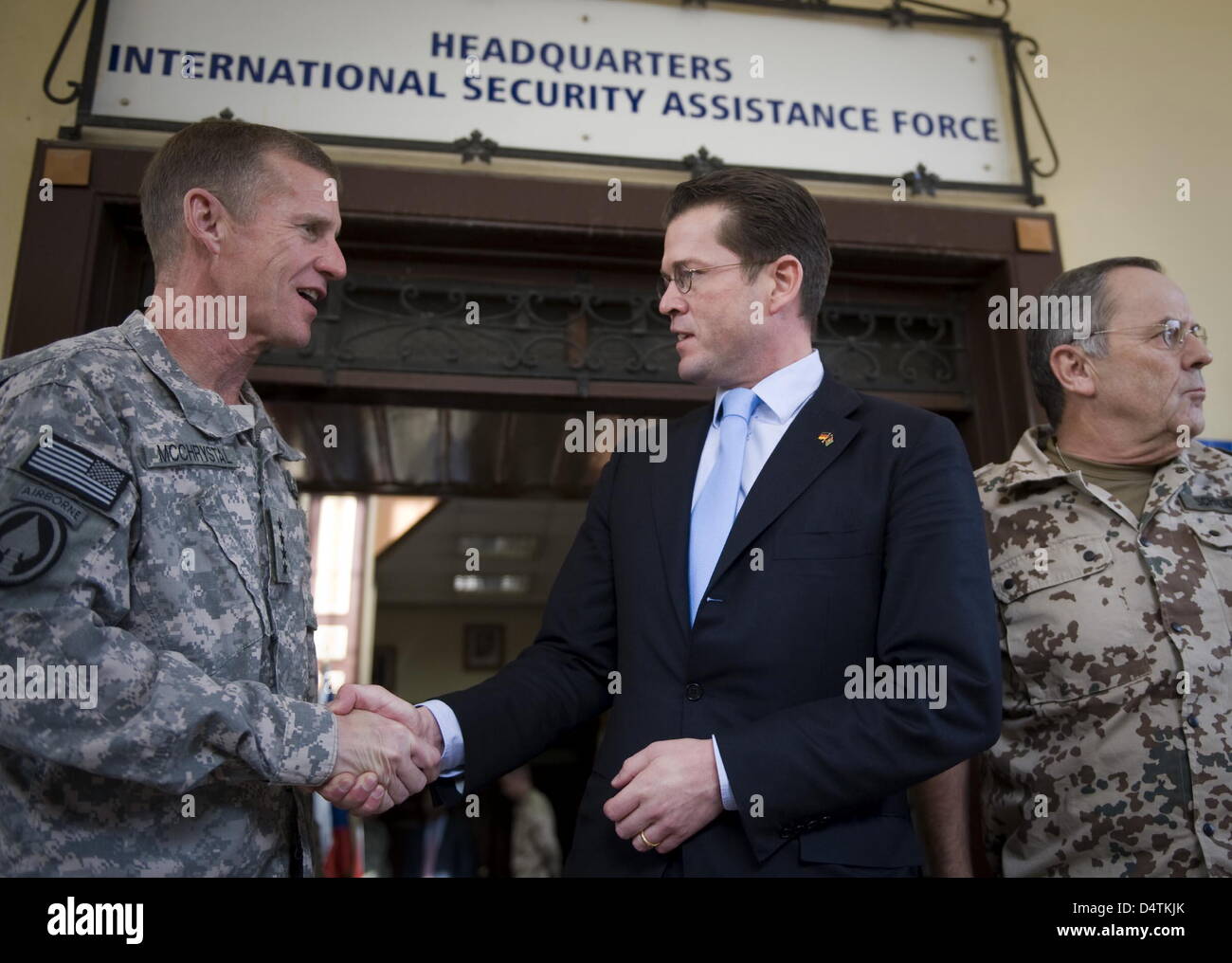 German Defence Minister Karl-Theodor zu Guttenberg (C) meets ISAF ...