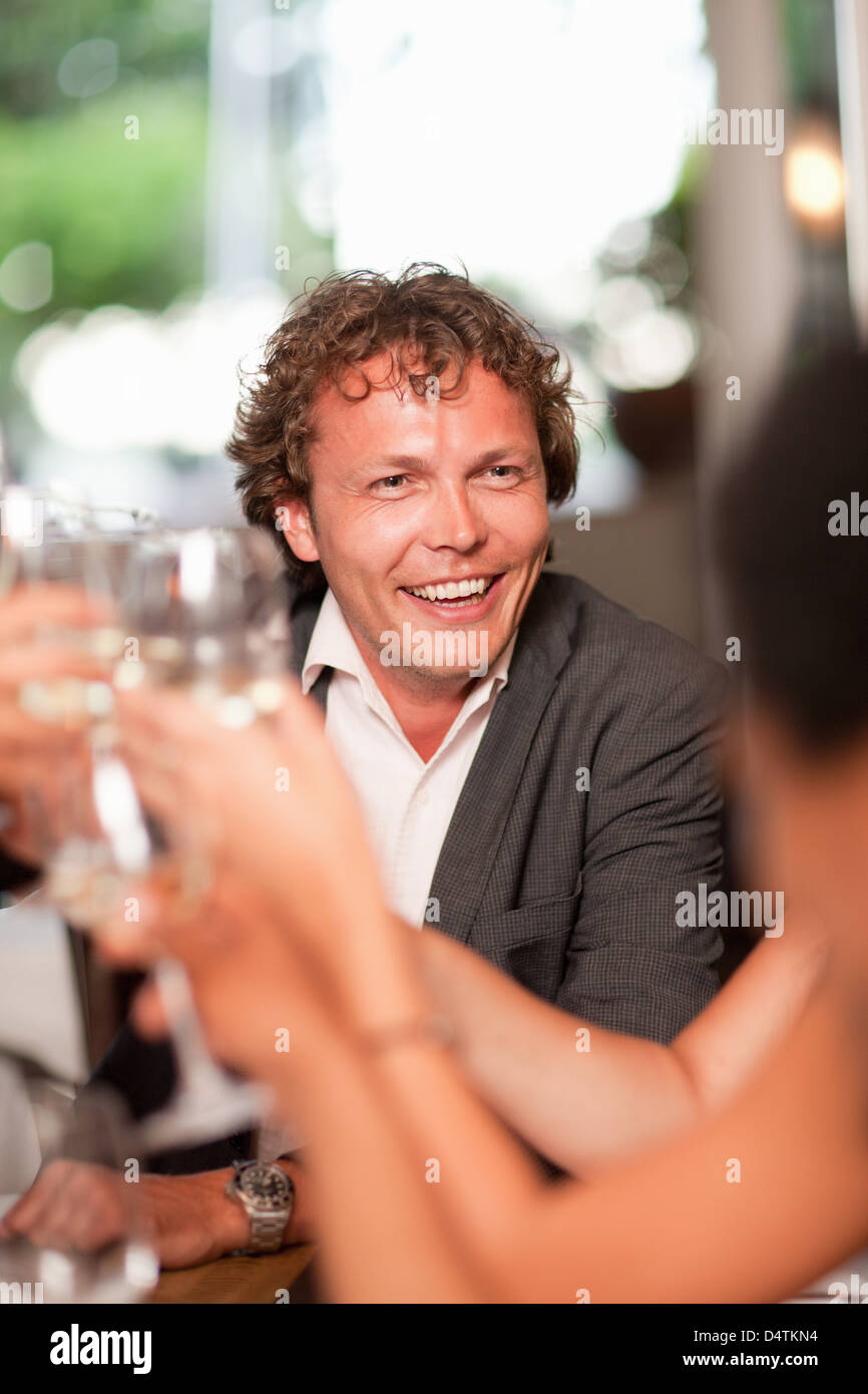 Business people toasting in restaurant Stock Photo - Alamy