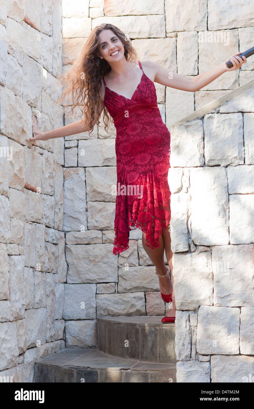 Woman climbing stone steps outdoors Stock Photo - Alamy