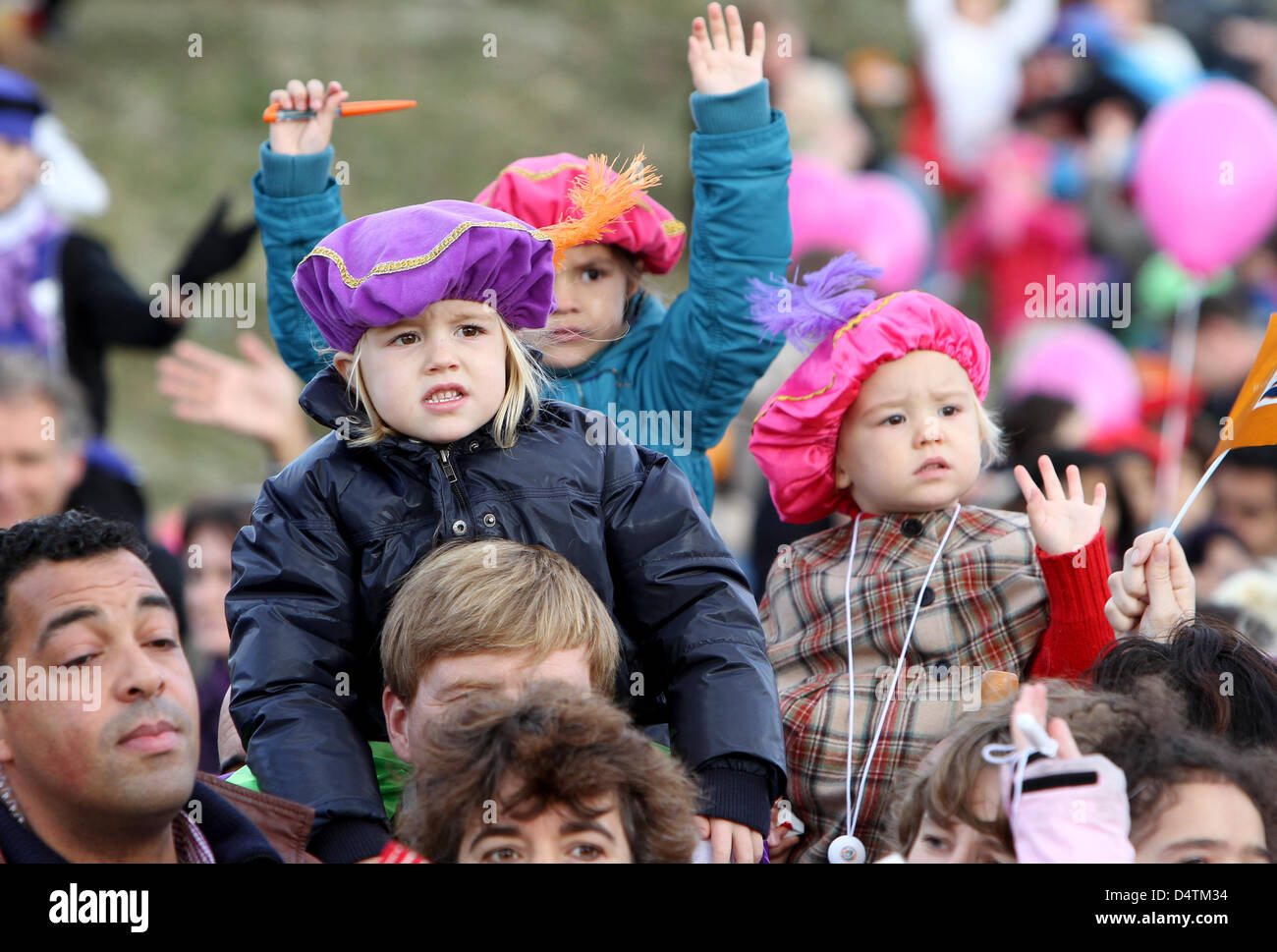 Dutch Crown Prince Willem-Alexander (hidden) and his daughters Princess ...