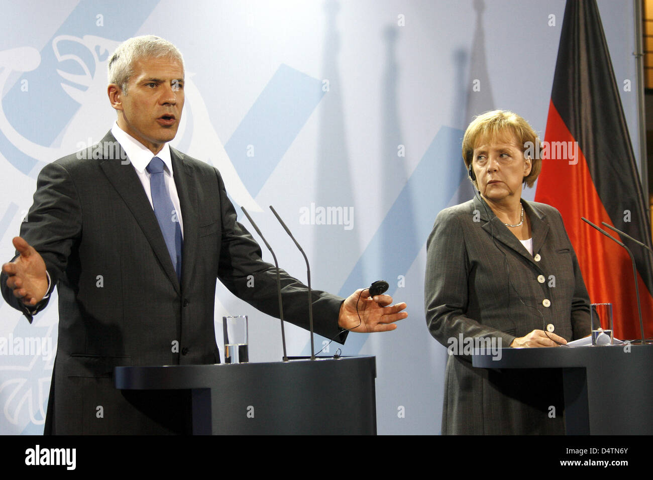 German Chancellor Angela Merkel (R) and Serbian President Boris Tadic ...