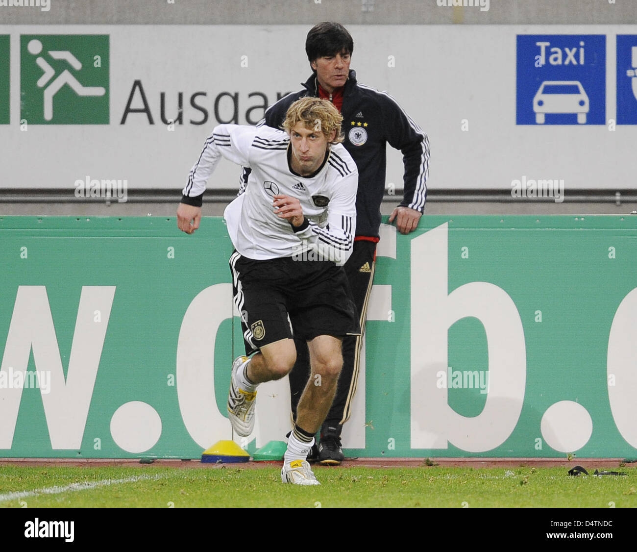 German national coach Joachim Loew (back) and Stefan Kiessling pictured ...