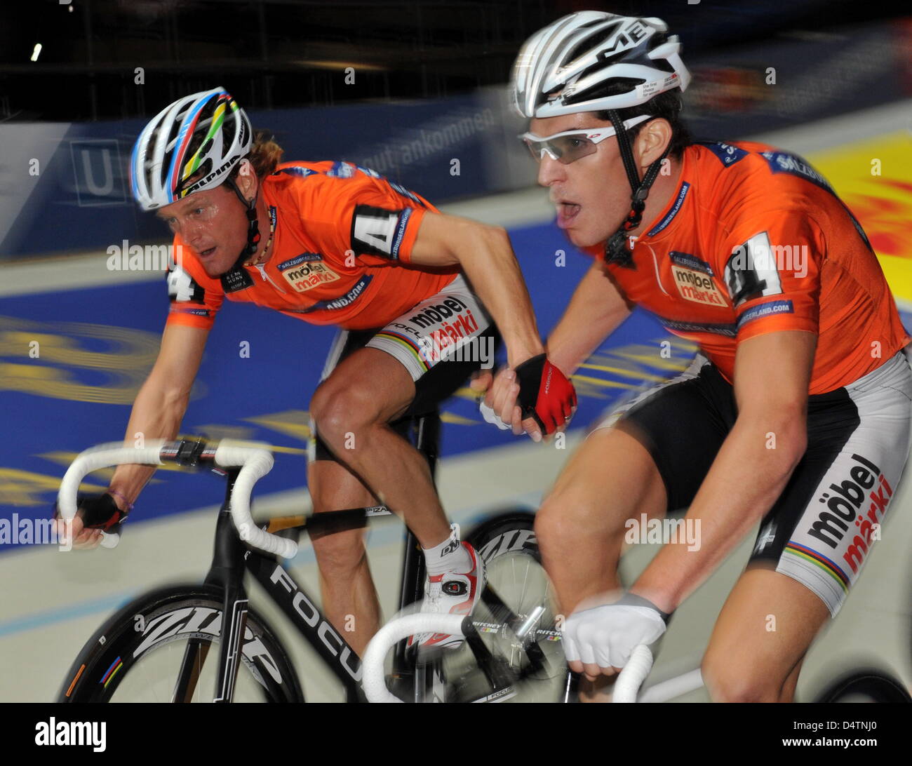 Swiss cyclists Bruno Risi (L) and Franco Marvulli seen in action during ...