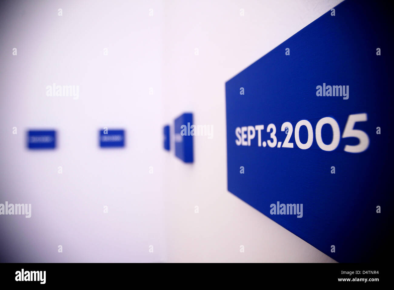 Visitors pass the artwork ?A corner piece - Aug 1,2,3, Sept. 1,2,3 ...