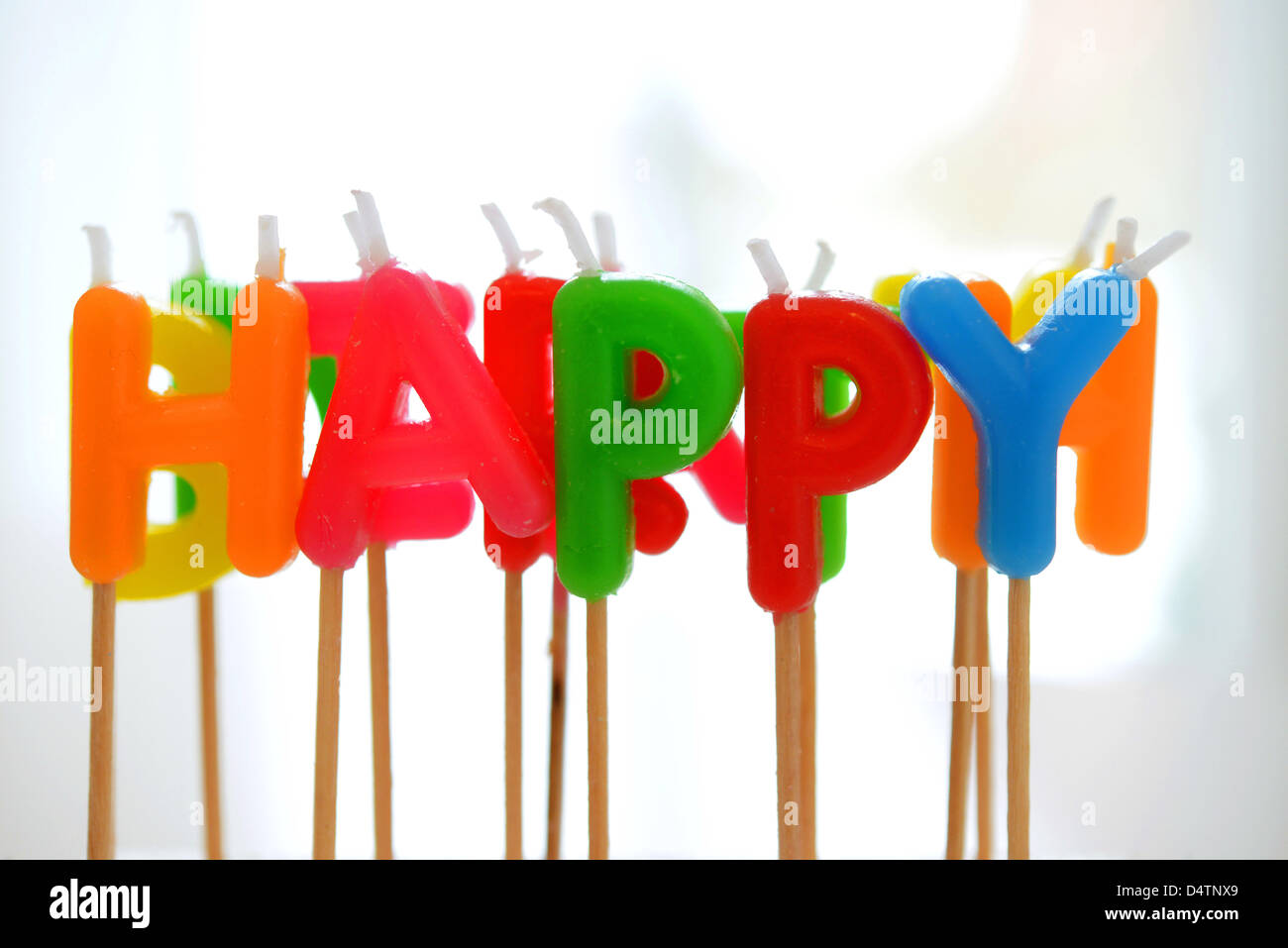 Letter candles for a birthday cake Stock Photo - Alamy