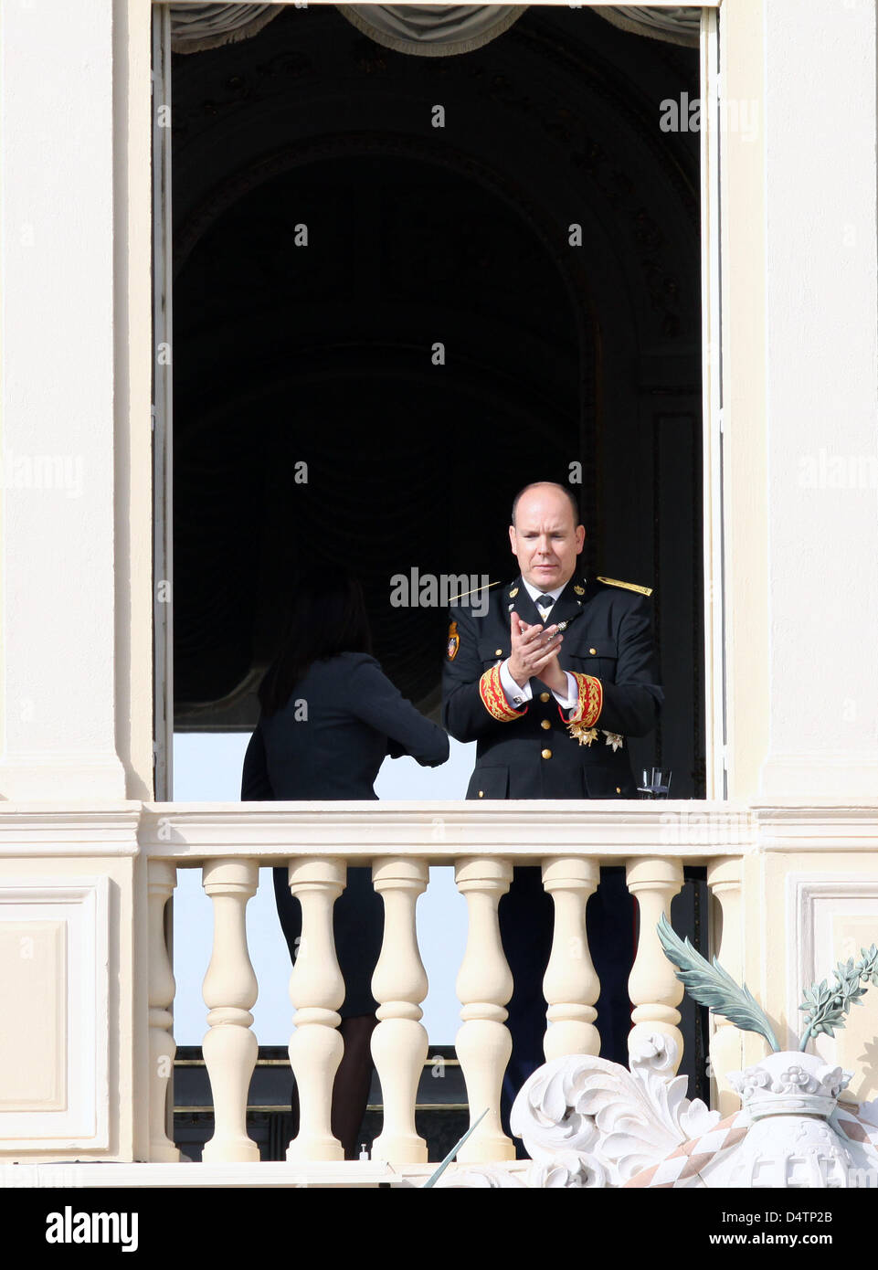 Prince Albert II of Monaco smiles on a balcony during the Army Parade ...