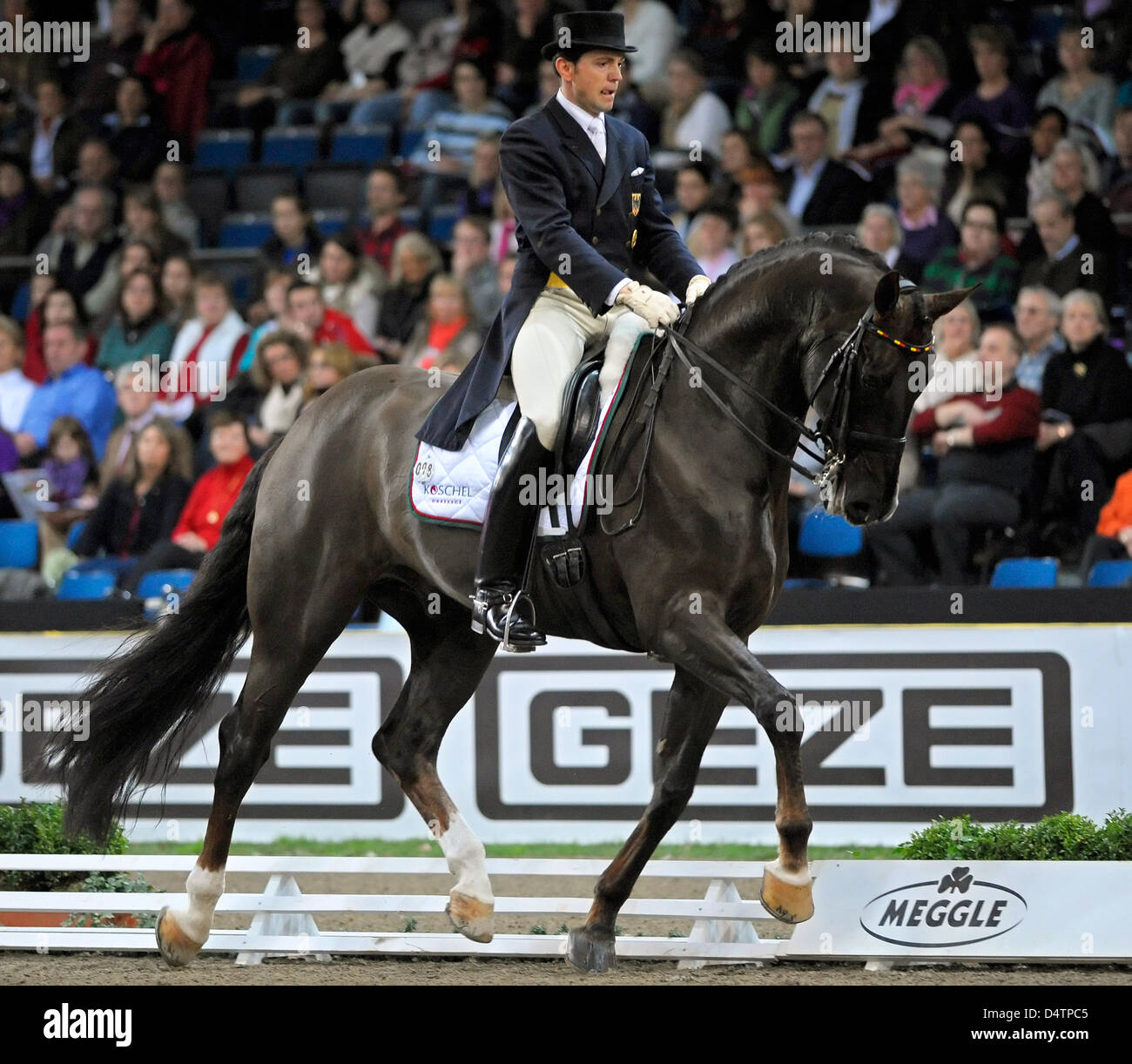 German Christoph Koschel on Donnperignon shown in action on the course ...