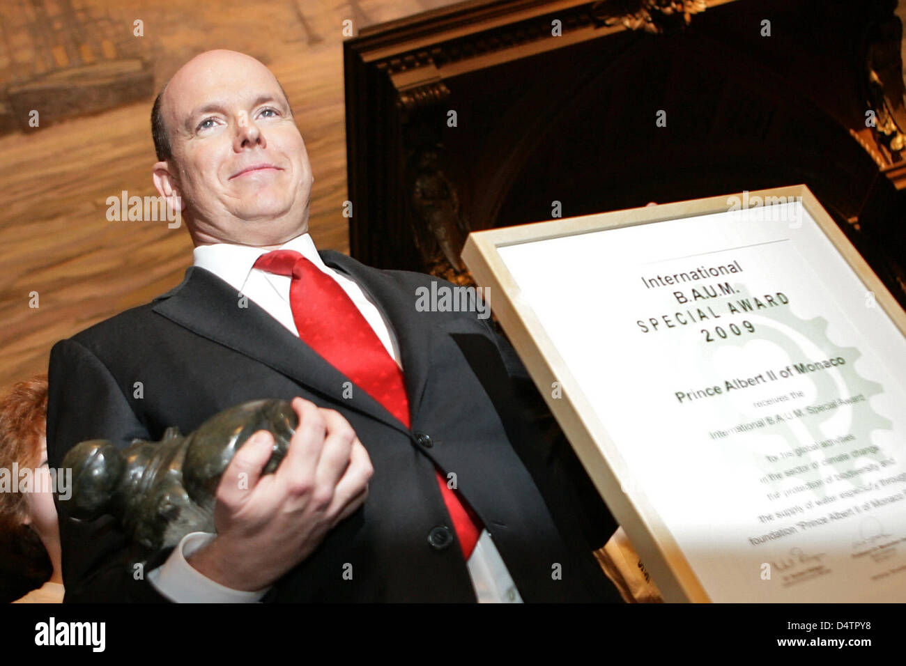 Prince Albert II of Monaco smiles with his International B.A.U.M ...