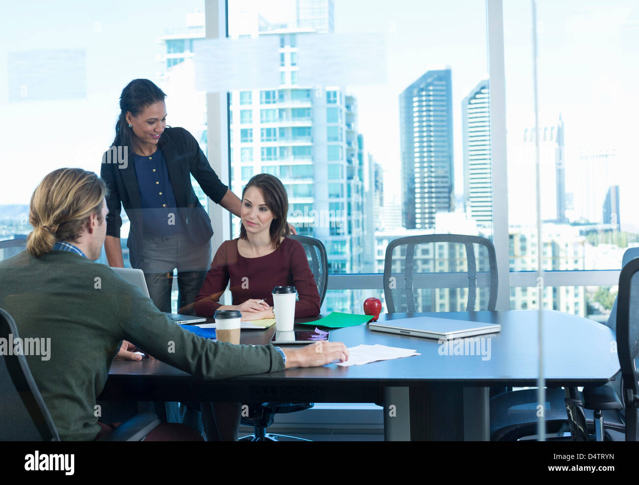 Business people working at desk Stock Photo - Alamy
