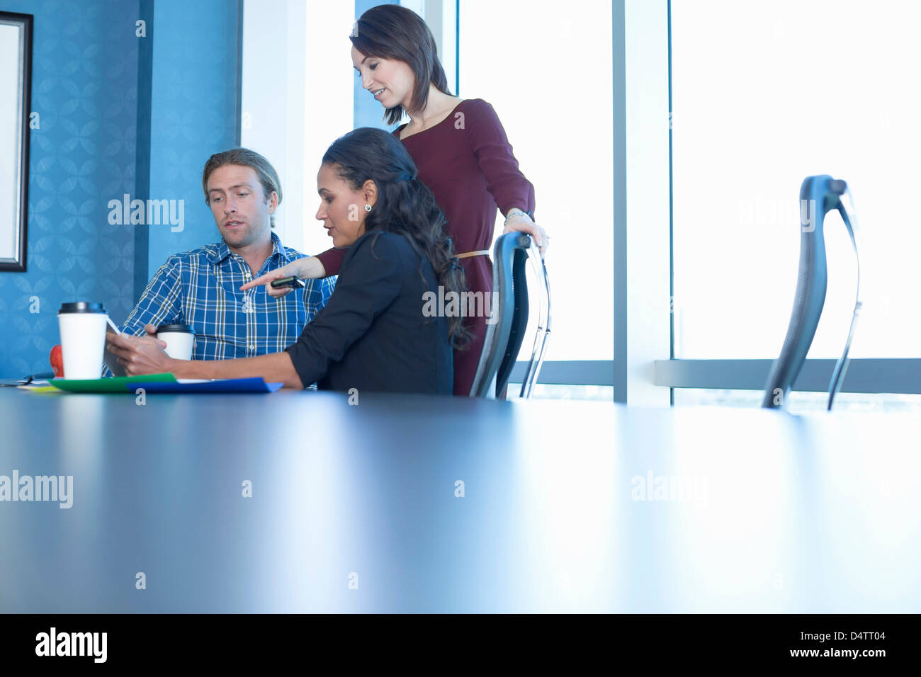 Business people working at desk Stock Photo - Alamy