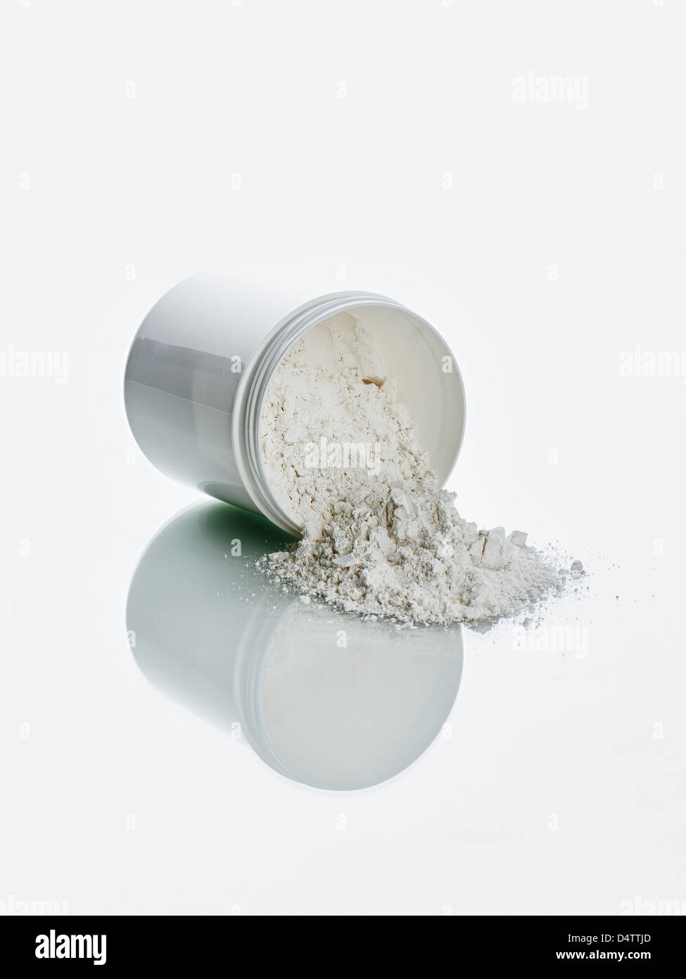 White powder and jar on counter Stock Photo - Alamy