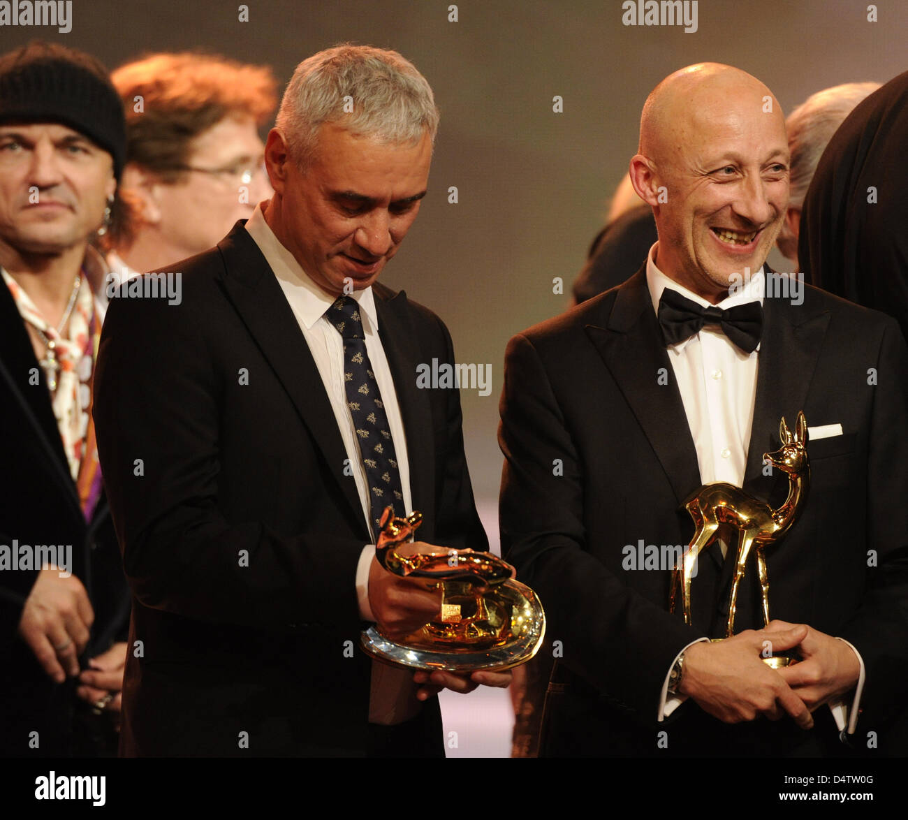 German filmmakers Oliver Hirschbiegel (R) and Roland Emmerich (L) smile ...