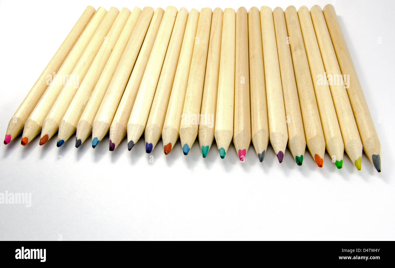 Colored pencils lined up Stock Photo - Alamy