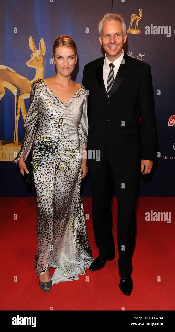 TV news presenters Marietta Slomka and her husband Christof Lang arrive ...