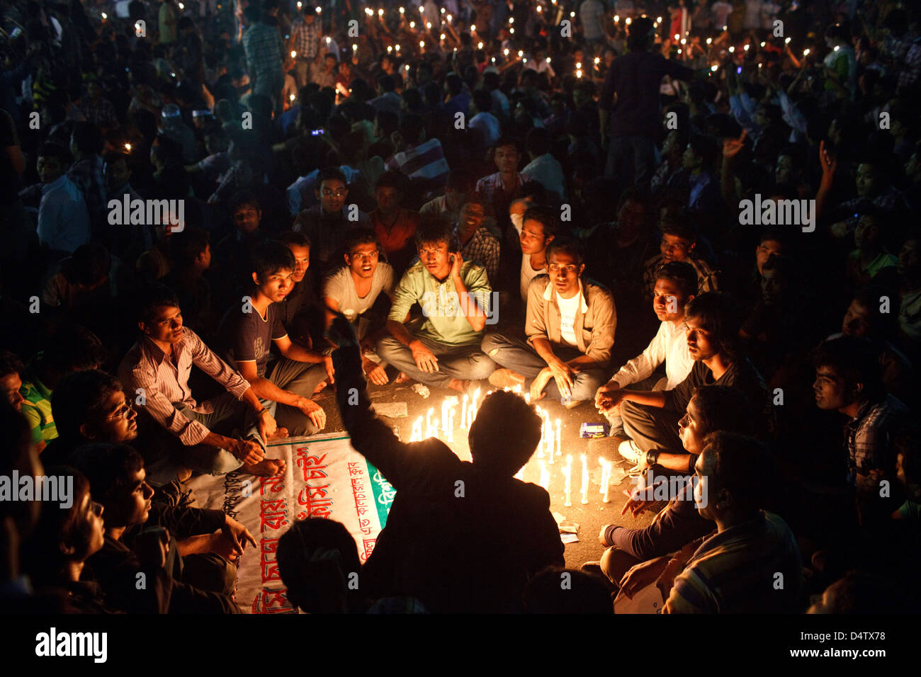 Protesters at night at the Shahbag (Shahbagh) intersection protest site ...