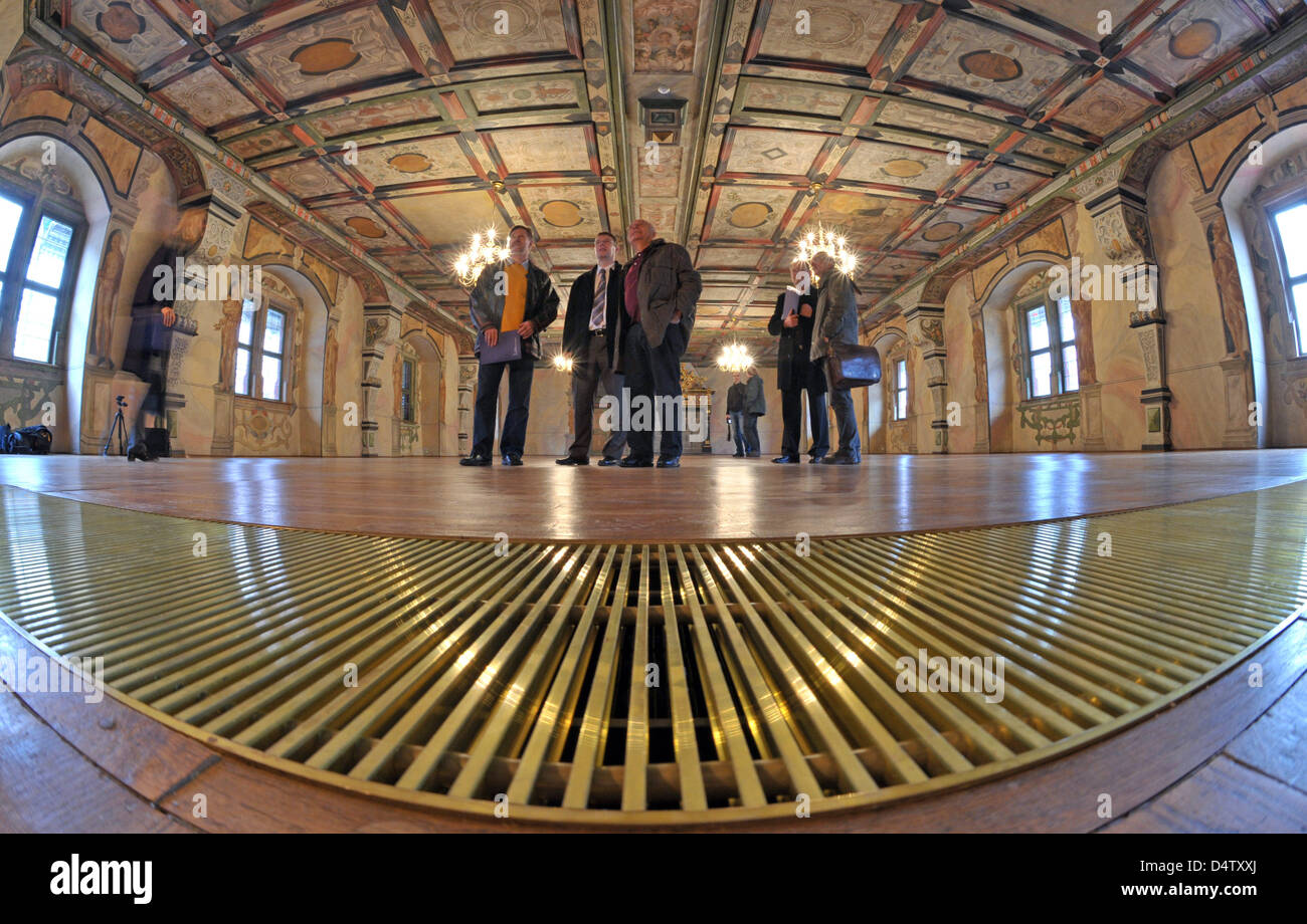 Visitors eye the restored Giant Hall of Wilhelmsburg Palace in ...
