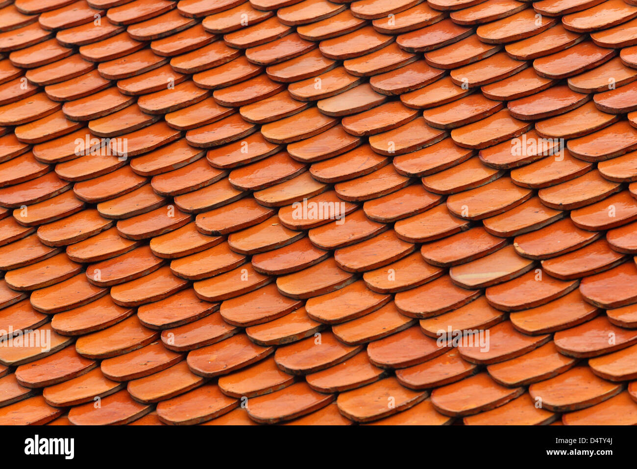 Thai temple roof tiles Stock Photo - Alamy