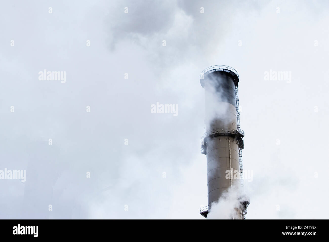 Steam from factory smokestack Stock Photo - Alamy