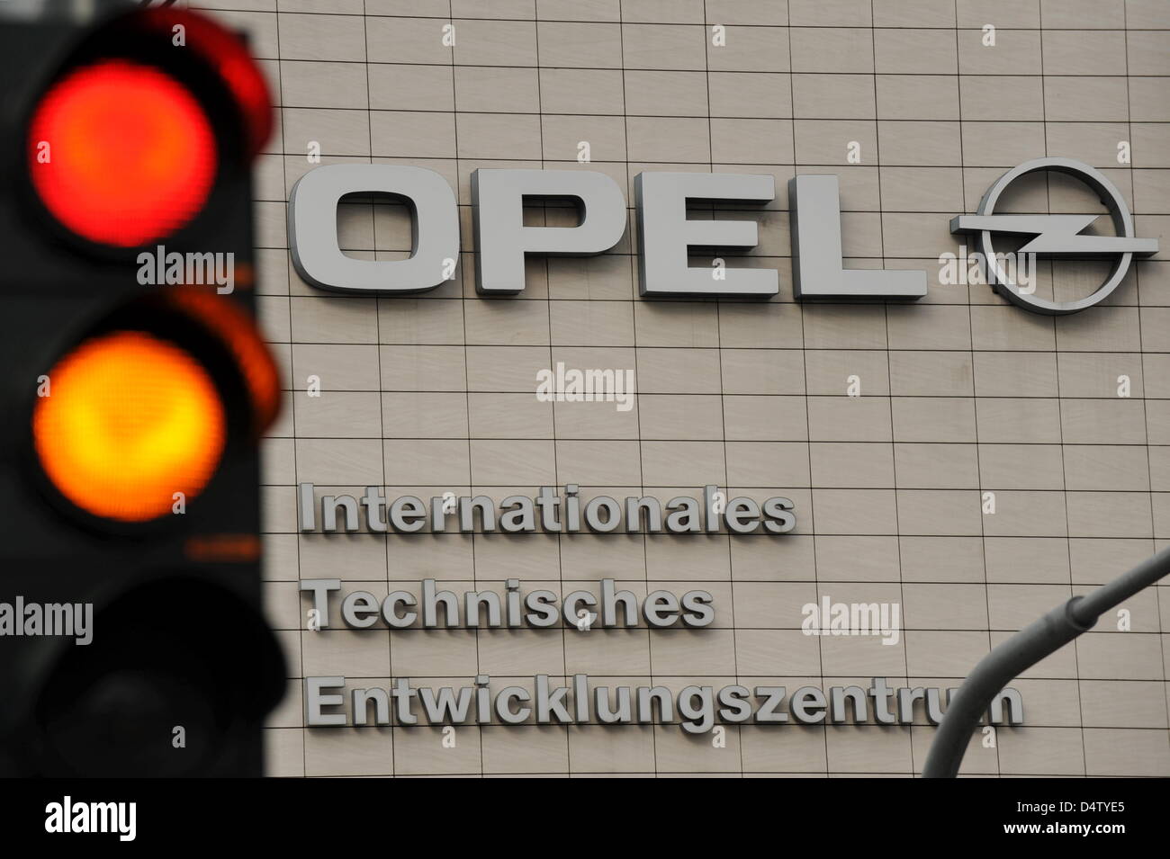 A traffic sign is red and yellow outside German carmaker Opel's ...