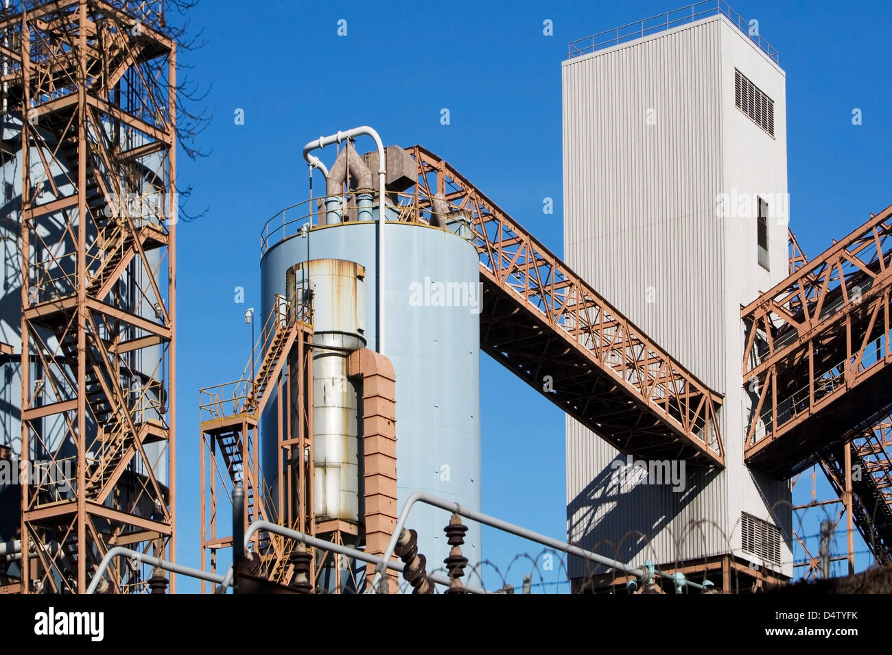 Factory infrastructure and silo Stock Photo - Alamy