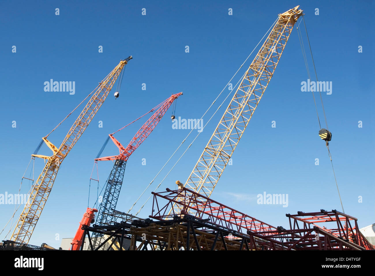 Three lifting cranes hi-res stock photography and images - Alamy