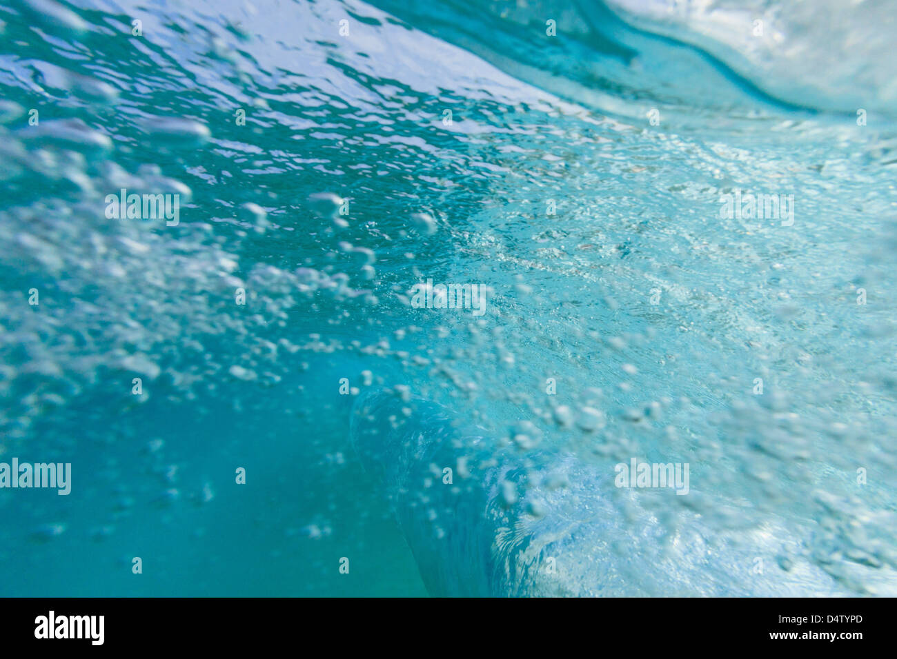 Crashing wave viewed underwater Stock Photo - Alamy