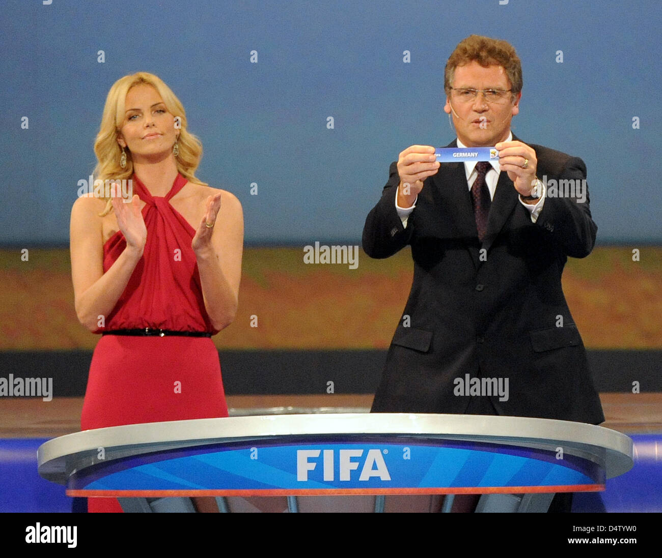 South African actress Charlize Theron (L) and FIFA Secretary-General ...