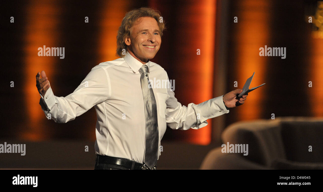 (L-R) German TV host Thomas Gottschalk smiles during the 185th edition ...