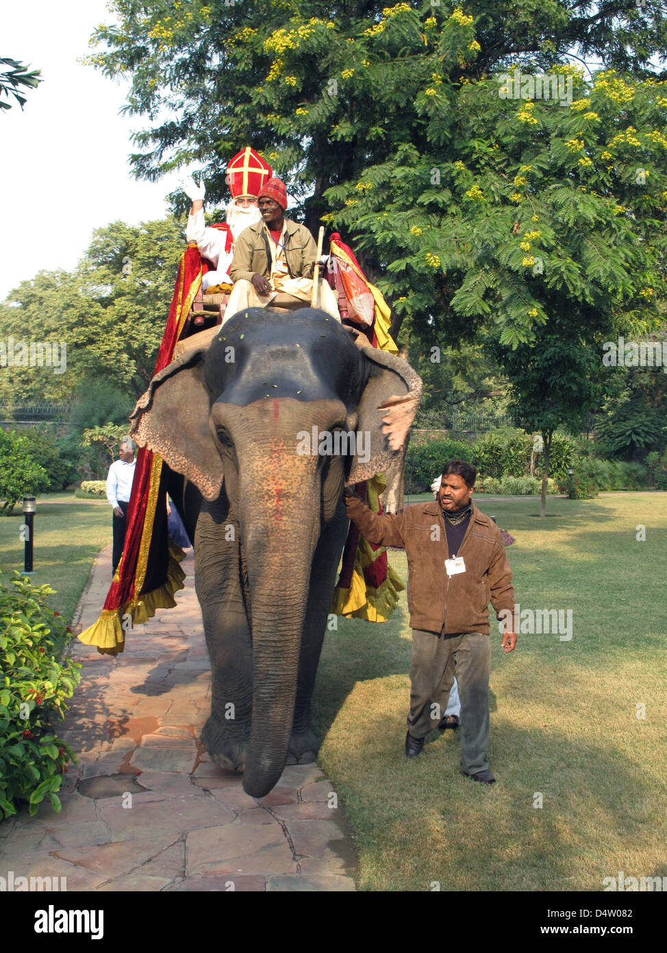 St Nicholas arrives on an elephant to the German Embassy to India in ...