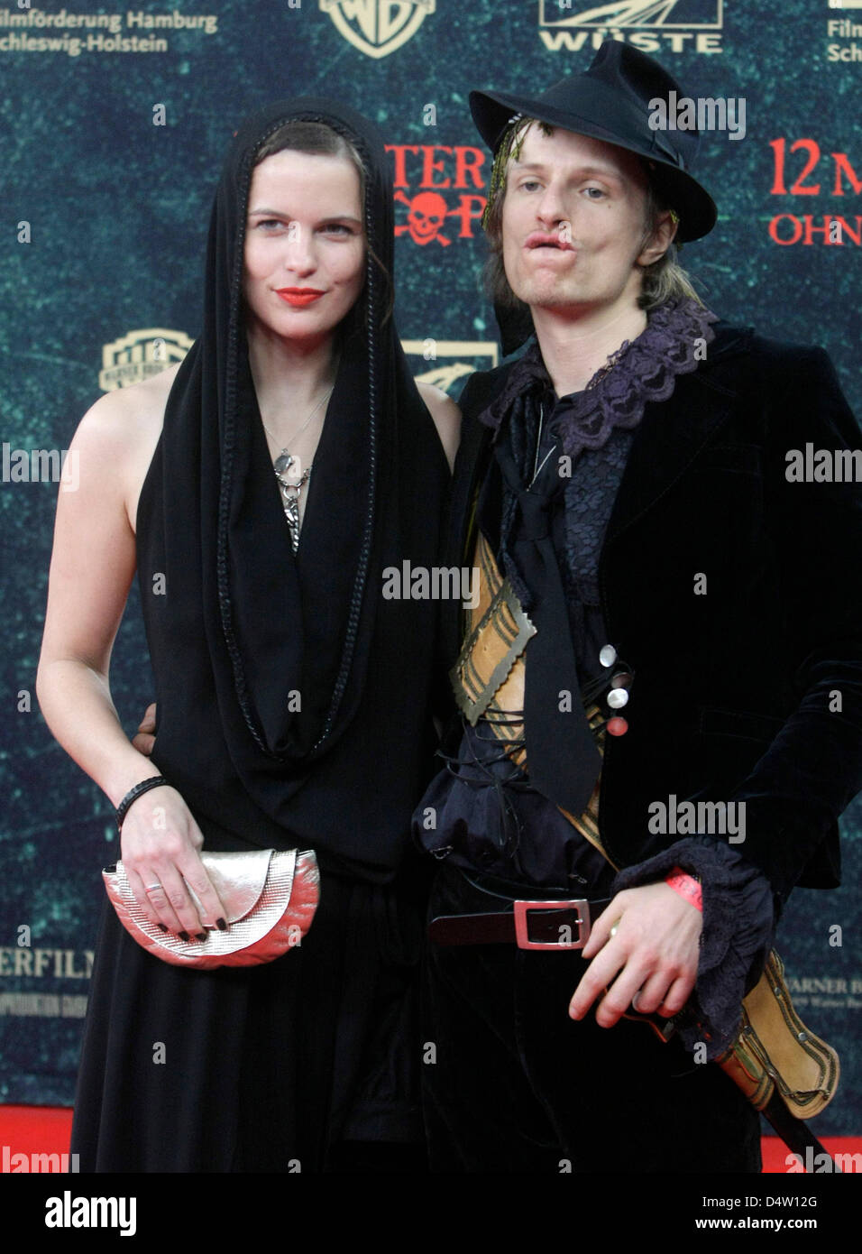 German actor Alexander Scheer and his unknown company pose at premiere ...