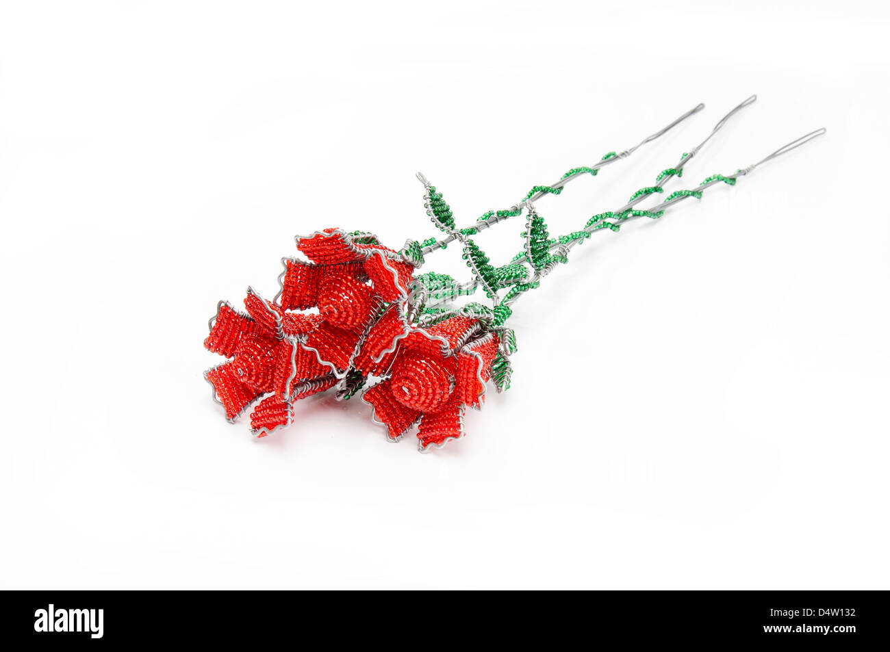 Three red beaded roses at a diagonal Stock Photo - Alamy