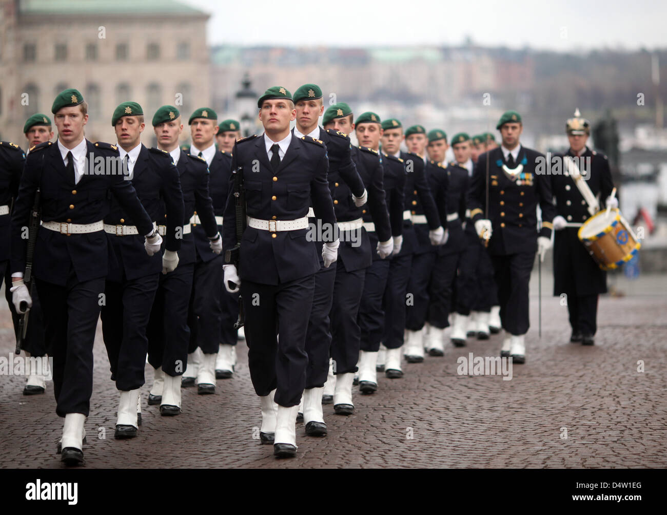 Swedish soldiers march to the change of guards at the Swedish Royal ...