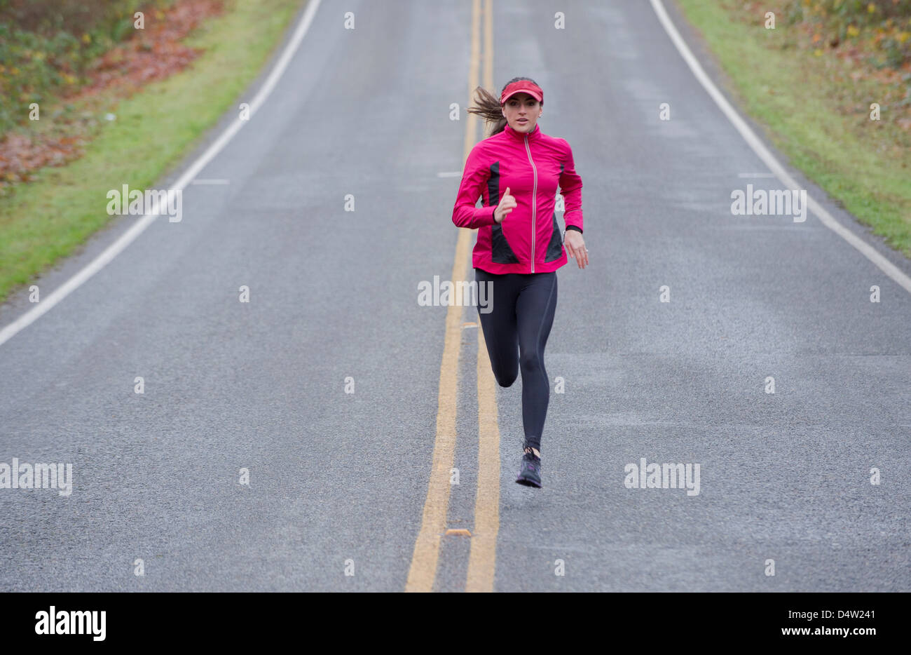 Running on the road hi-res stock photography and images - Alamy