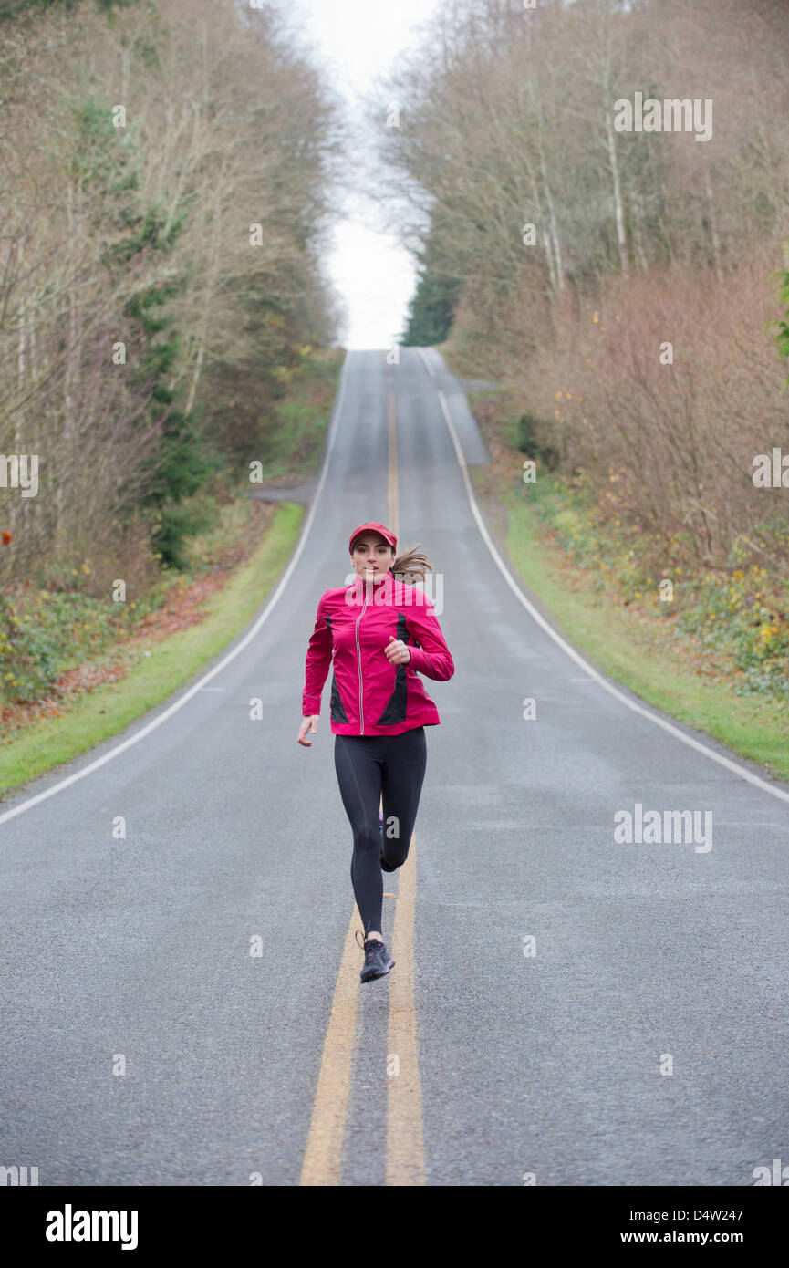 Running on the road hi-res stock photography and images - Alamy