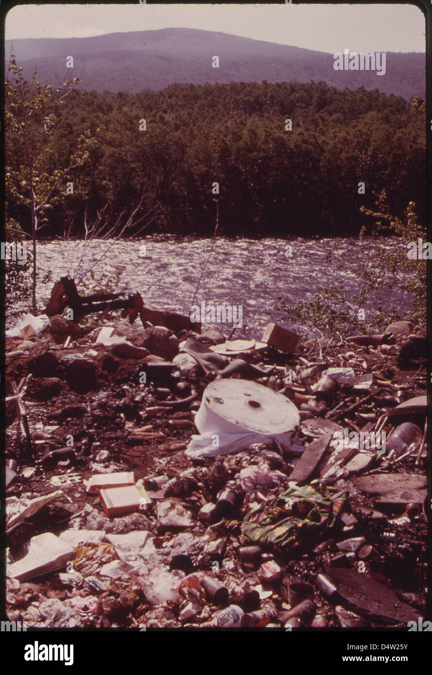 A photograph from June 1973 showing the riverside dump in Gorham, a ...