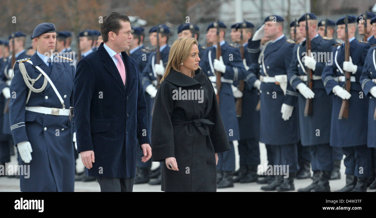 German Defence Minister Karl-Theodor zu Guttenberg (2-L) and his ...