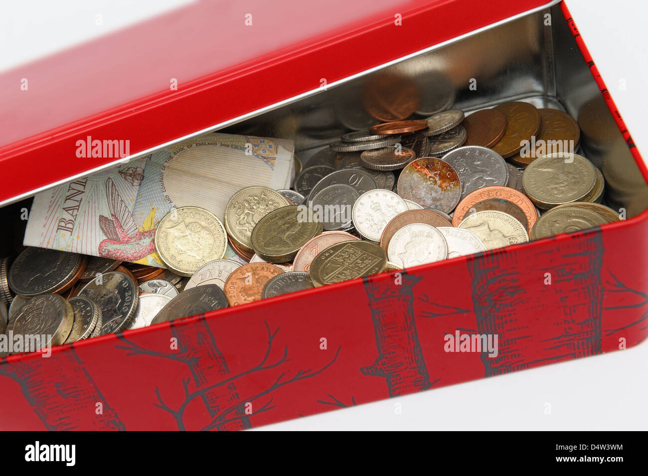 Red money tin Stock Photo - Alamy
