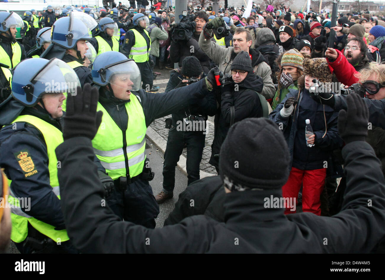 Danish policemen take action against environmental activists at the UN ...