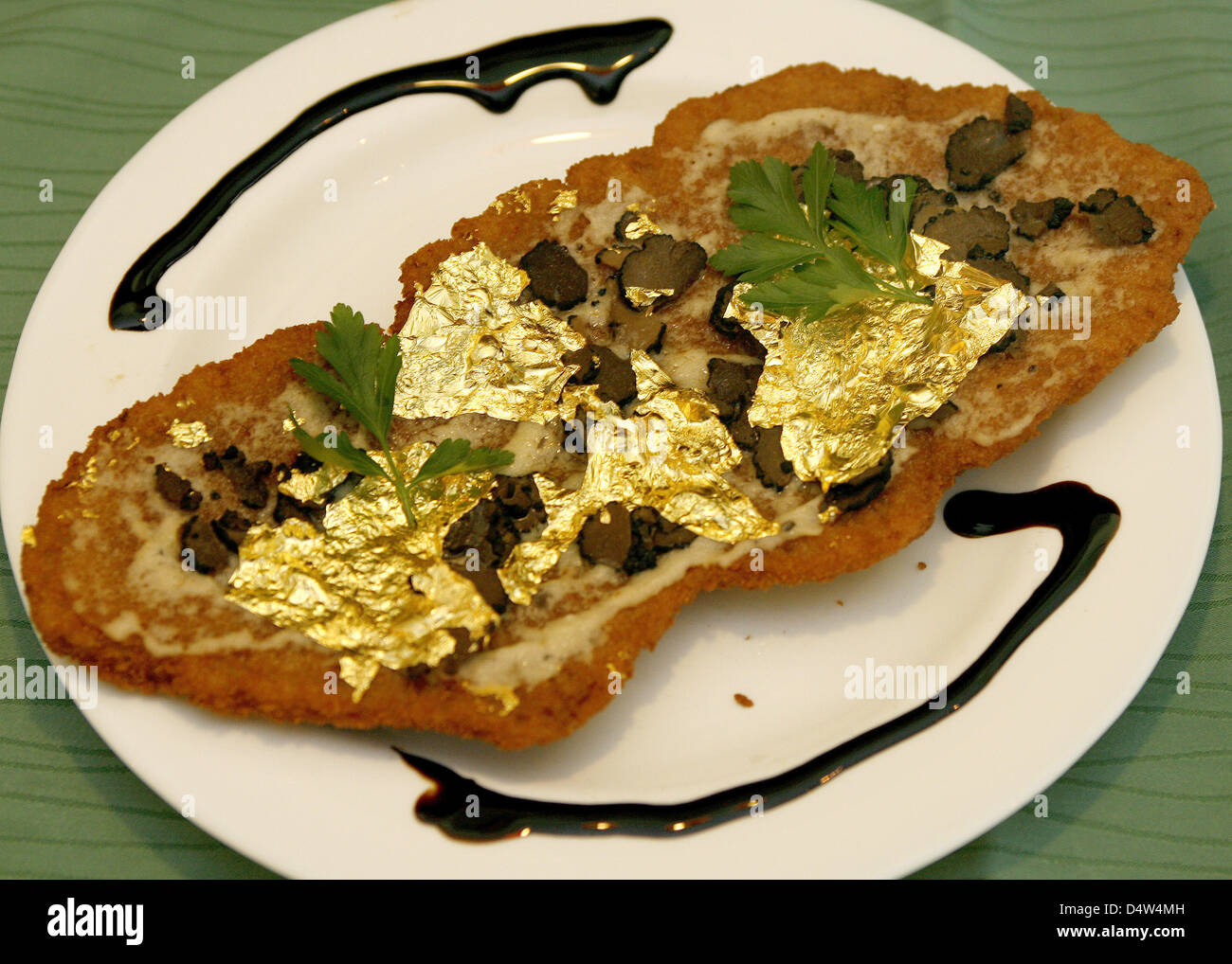 A 'Schnitzel' covered with 24-carat gold foil at a self-service ...