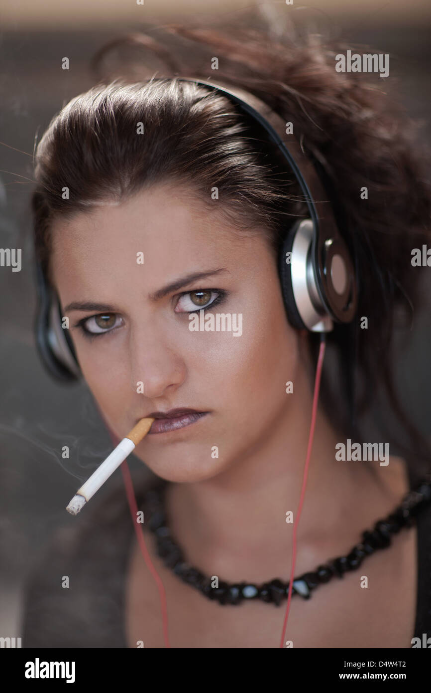 Female girl smoking looking into the camera hi-res stock photography ...