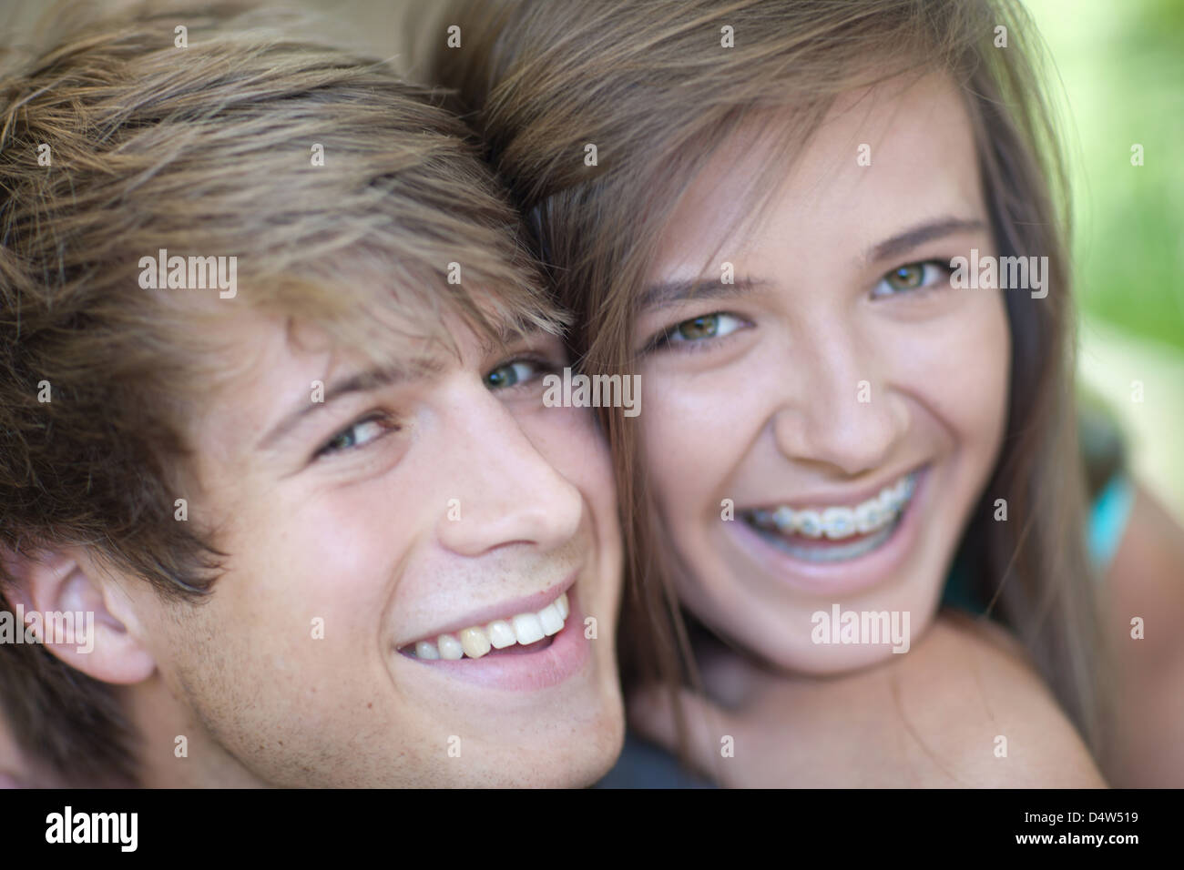 Couple smiling together outdoors Stock Photo - Alamy