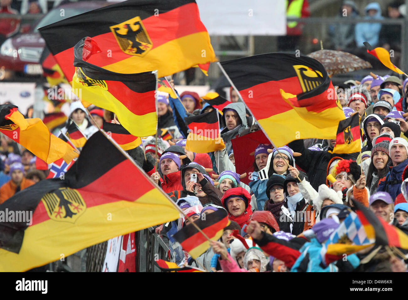 German fans watch the jumps from the Schattenberg ski-jump at the first ...