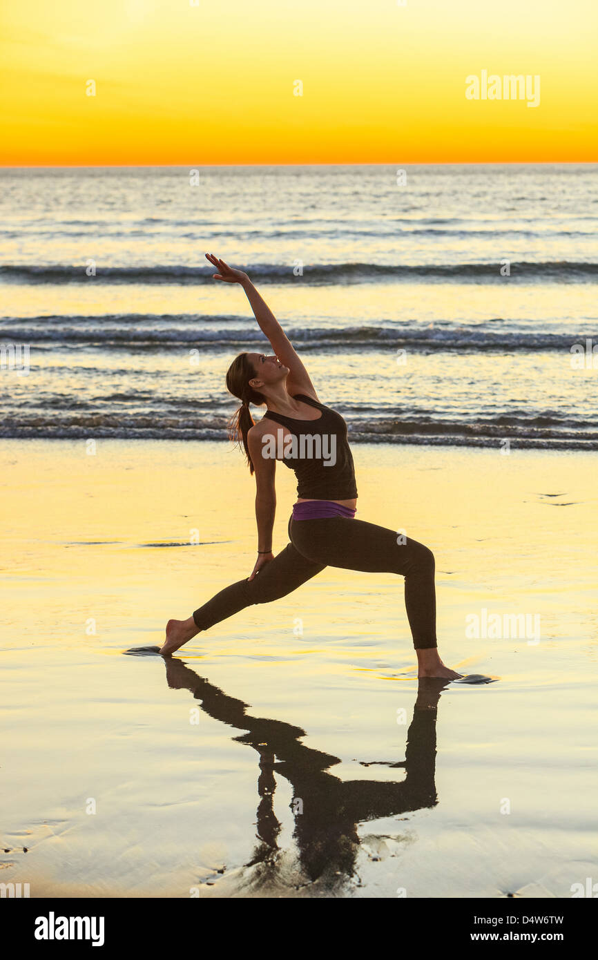 Woman stands on yoga hi-res stock photography and images - Alamy