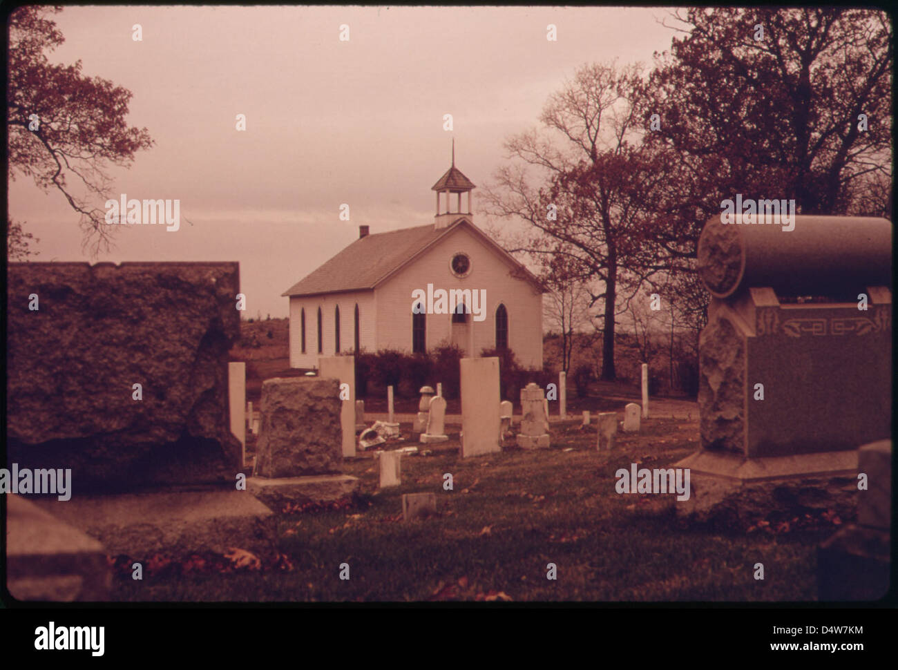 This 1973 photograph shows a cemetery and church in southeast Ohio ...